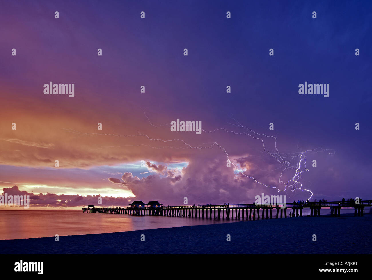 Florida, Naples, beach, sundown, pier, lightning Stock Photo - Alamy