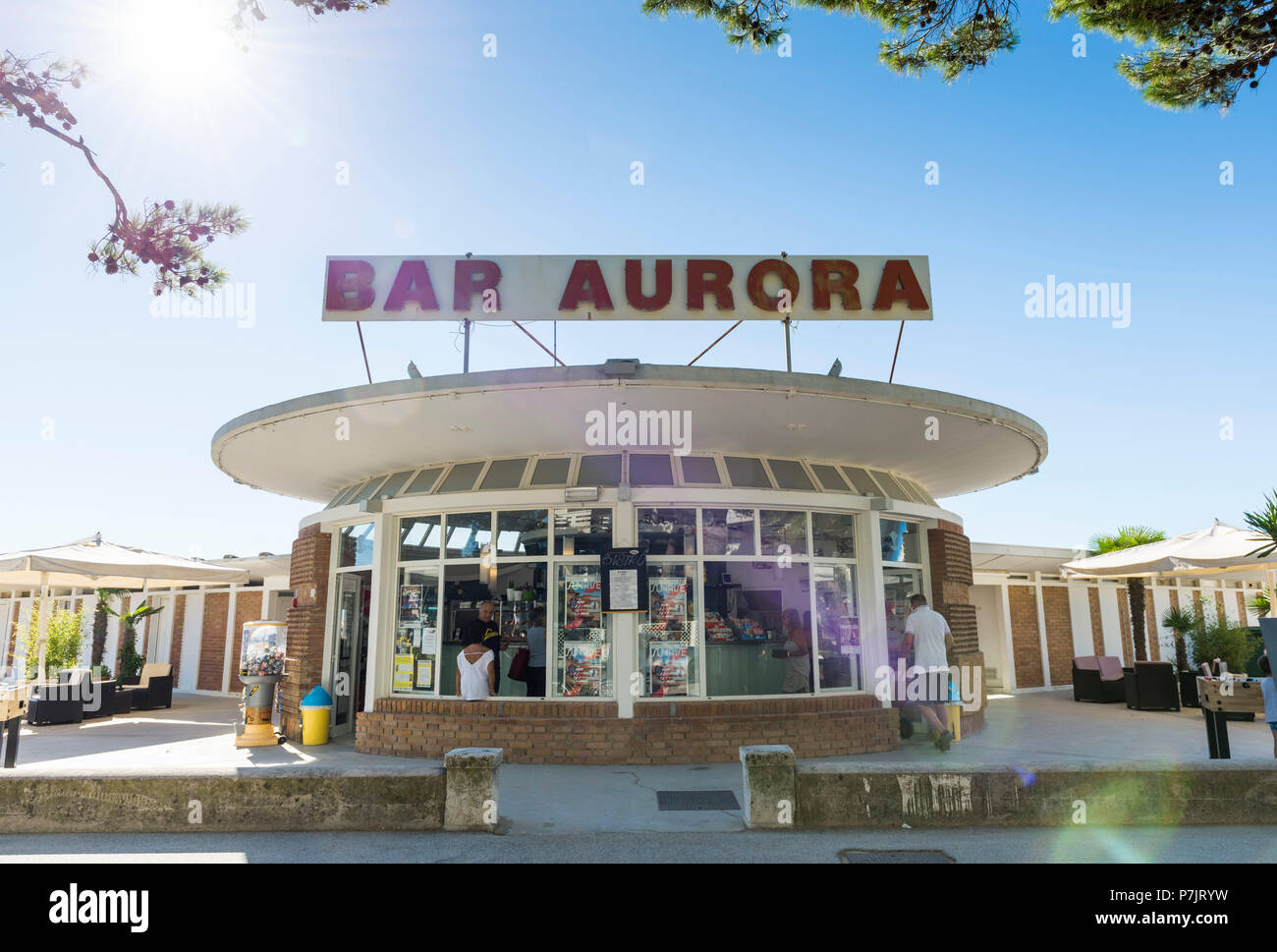 View of 'Aurora' beach bar, architecture on the beach of Lignano Stock ...
