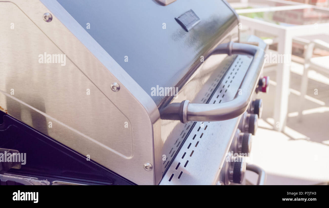 Step by step. Outdoor gas grill on back patio in the Summer Stock Photo ...
