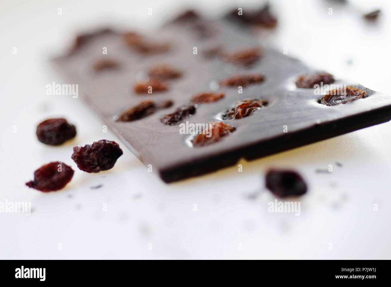 Dark chocolate with raisins Stock Photo - Alamy
