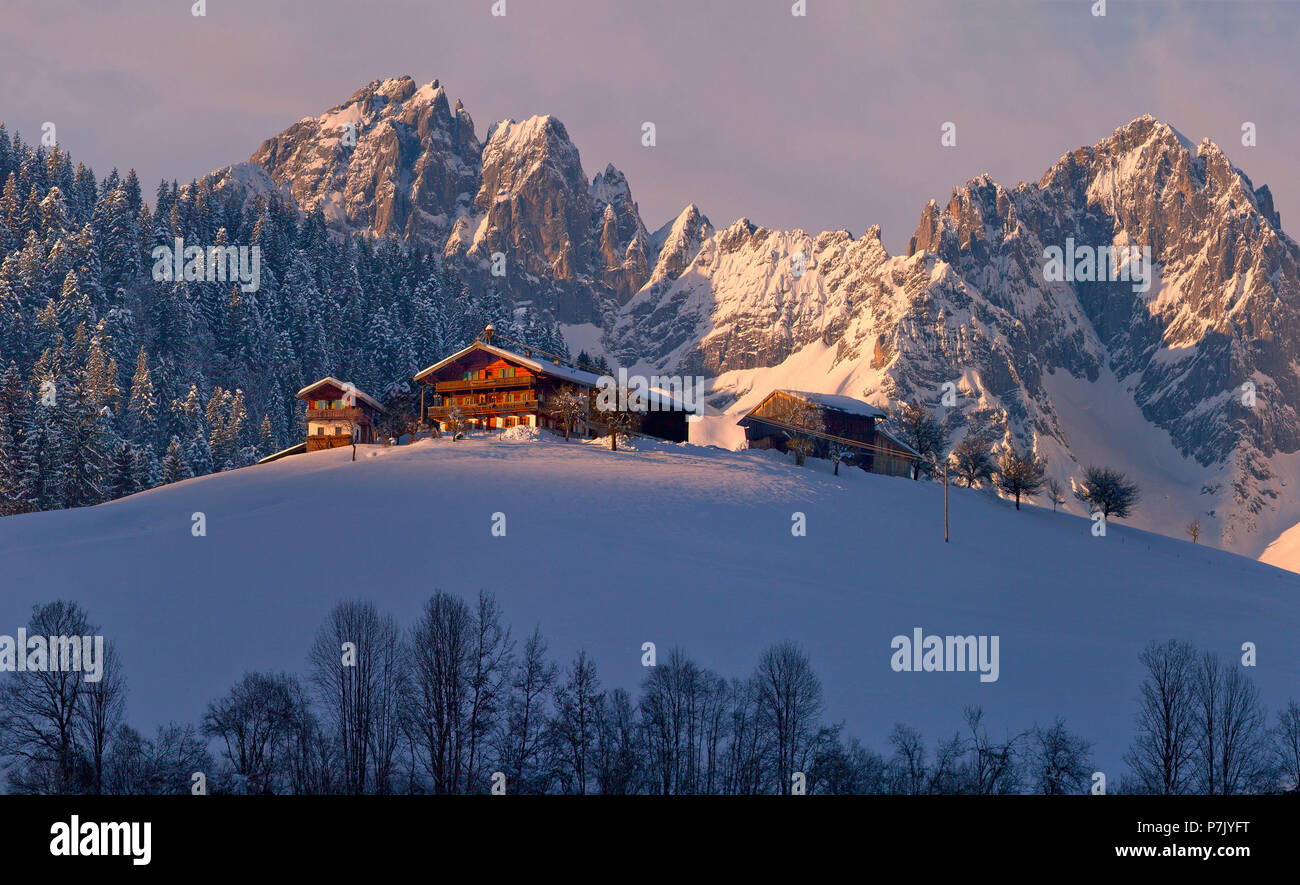 Austria, Tyrol, farm near Kitzbühel against Wilder Kaiser Stock Photo ...