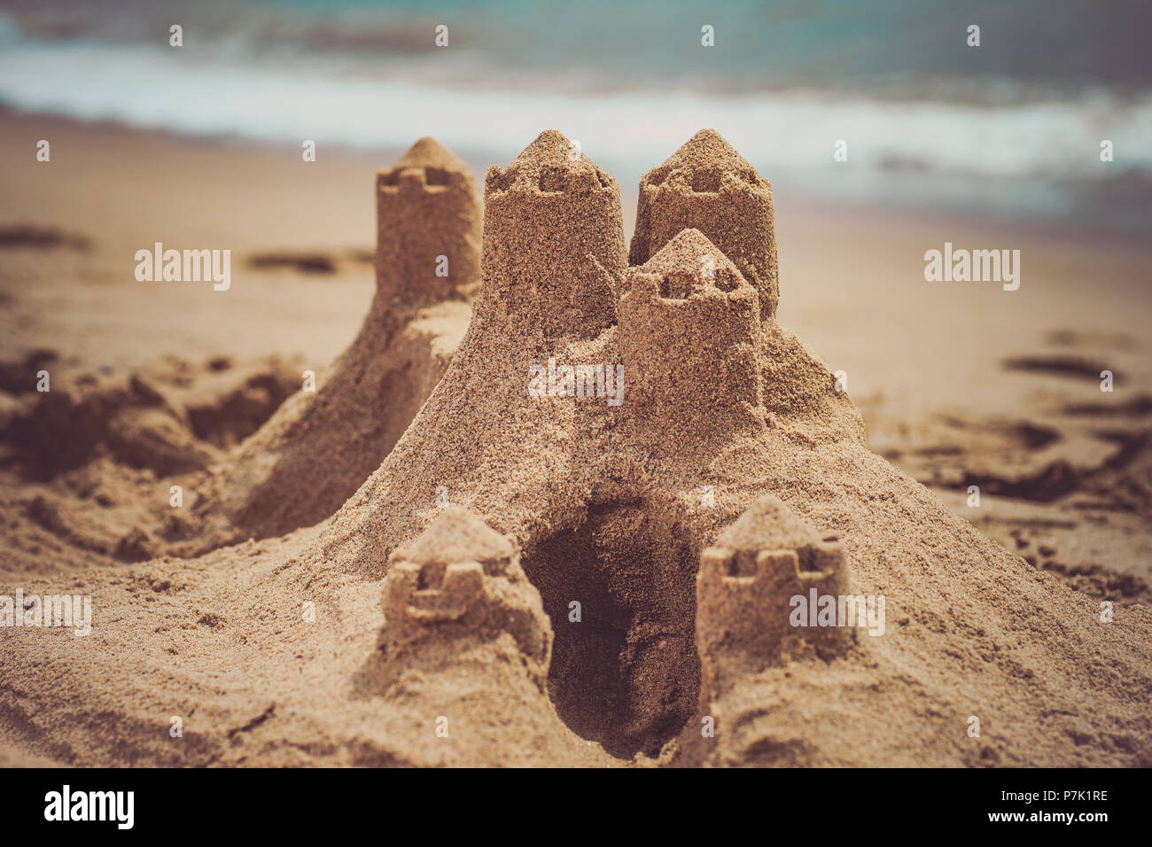 Sand castle standing on the beach. Travel vacations concept Stock Photo ...