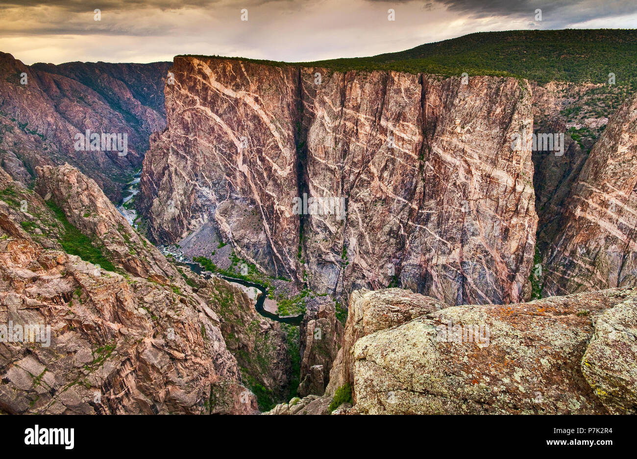 Stripes of pegmatite, a light-colored granite, on the Painted Wall at ...