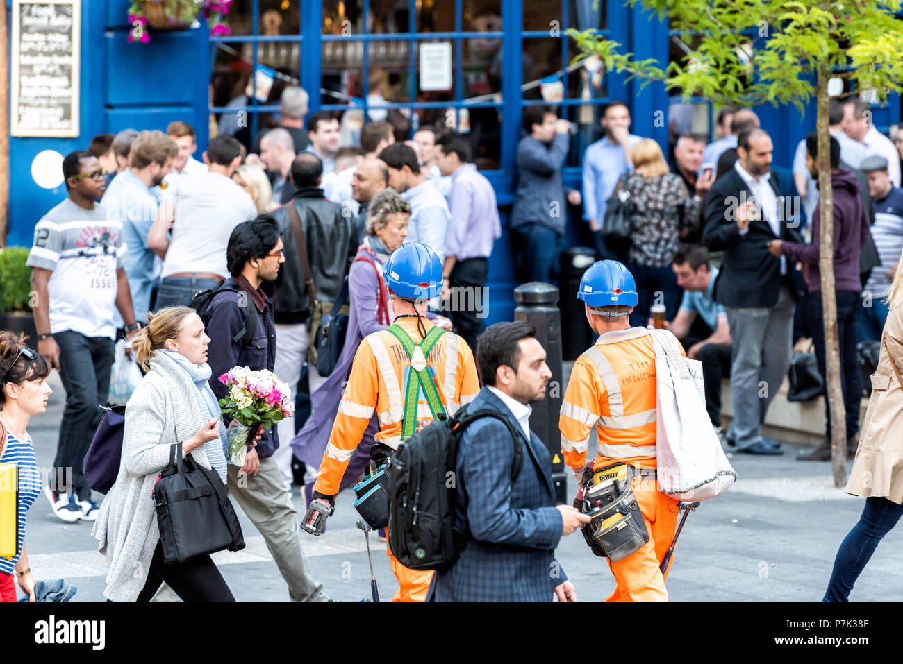 London, UK - June 22, 2018: Crowd of many people two construction ...