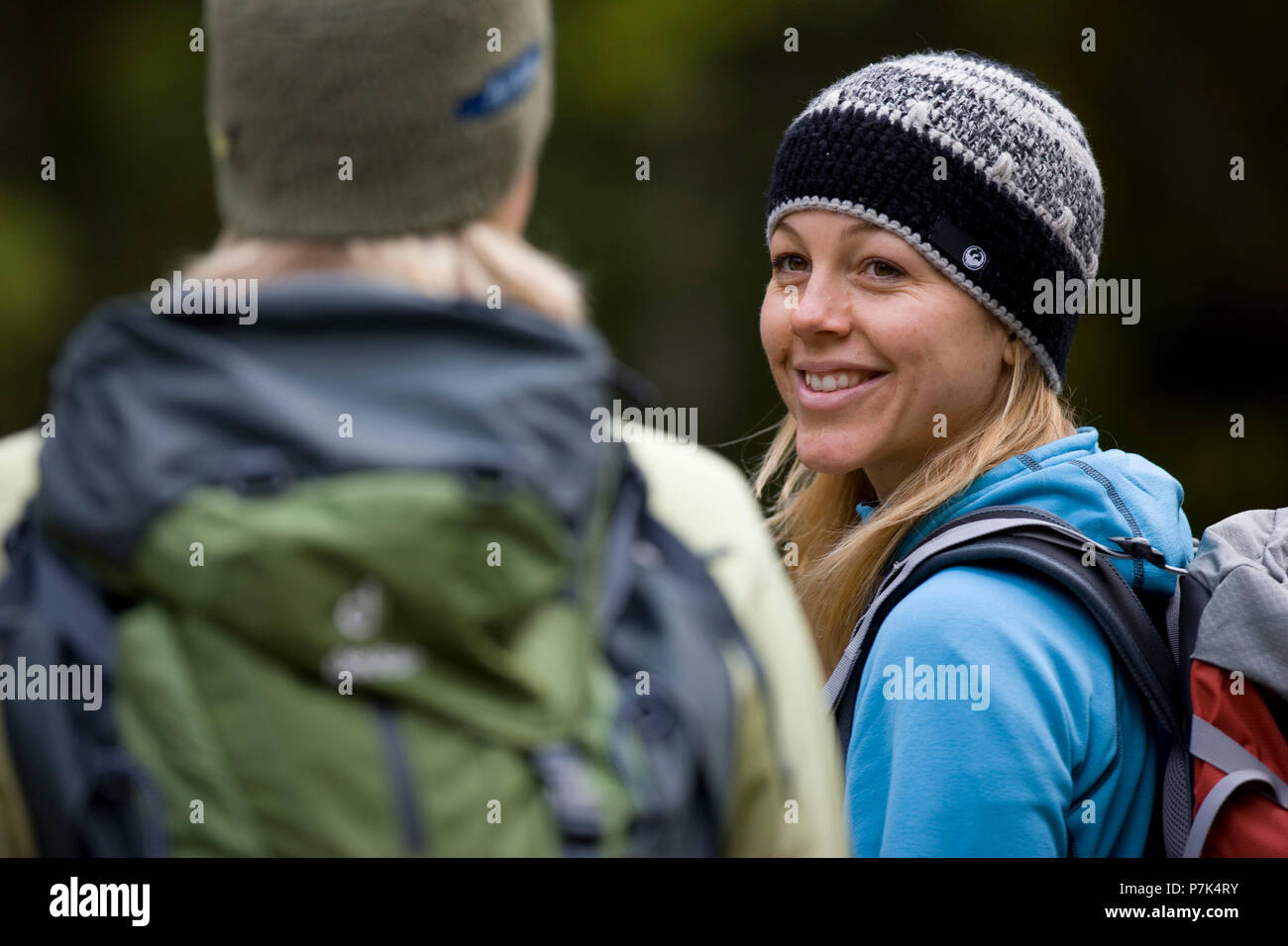 Two women while hiking, portrait Stock Photo - Alamy