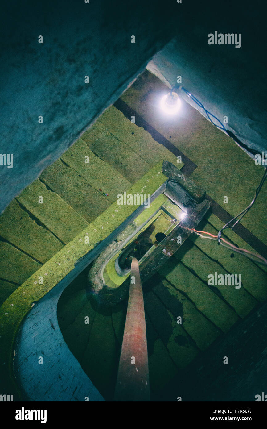 Spiral decayed stairs in a cracked building with 27 floors Stock Photo ...