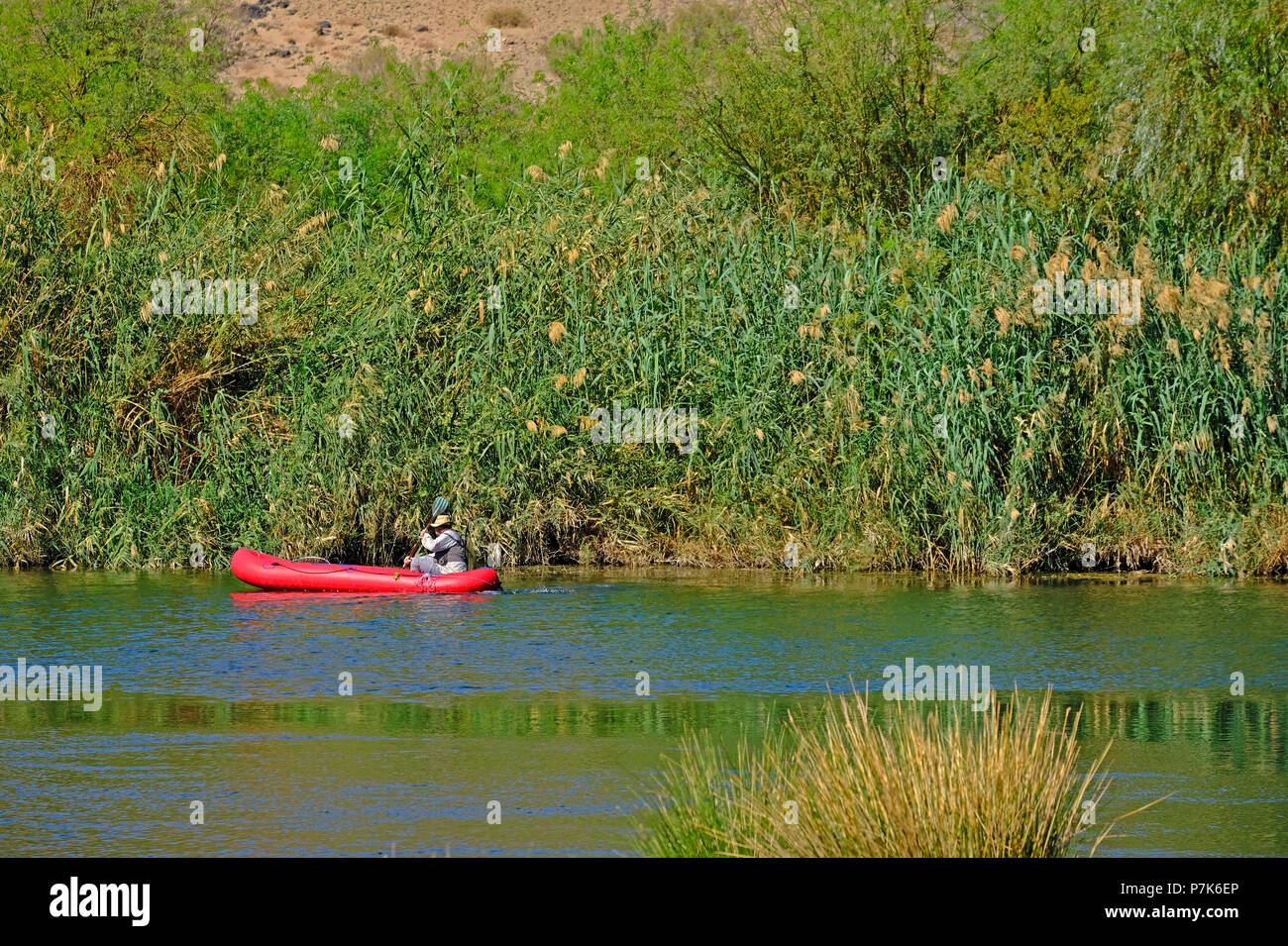 narrowed riverbed of the Orange River / Oranjerivier (border river) in ...
