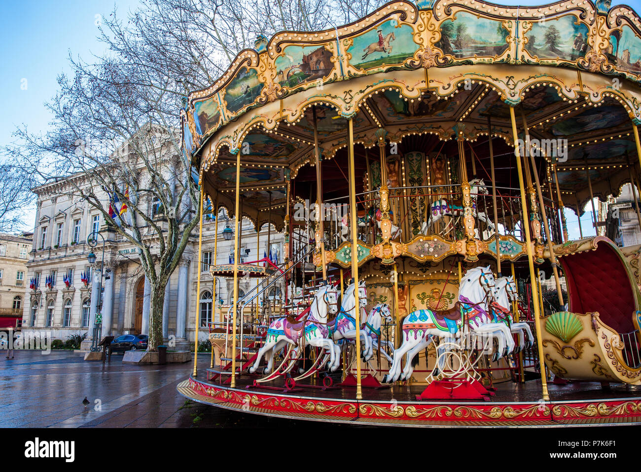 French old-fashioned style carousel with stairs at Place de l'Horloge ...