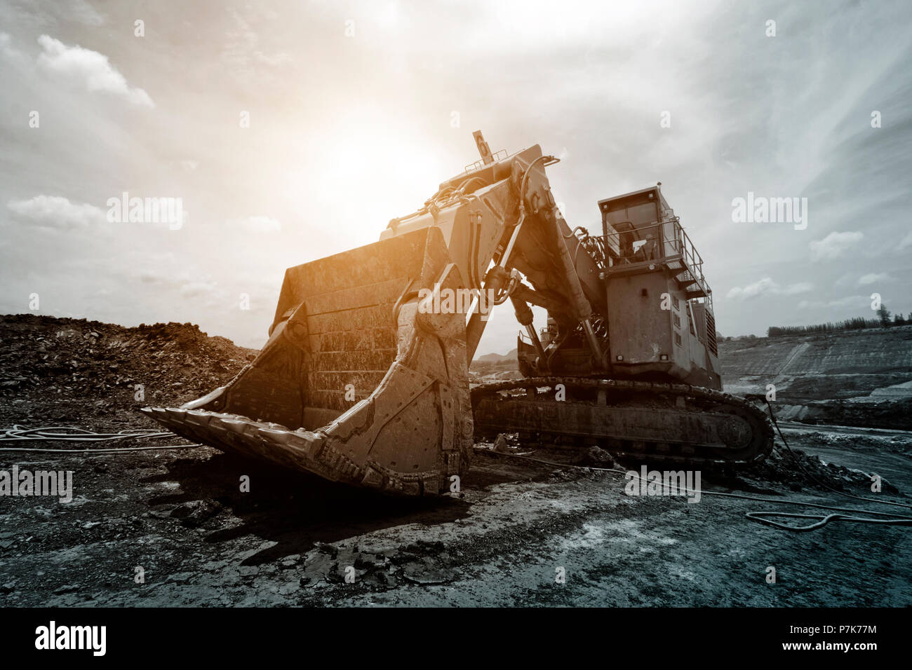 track-type loader excavator machine doing earthmoving in the process of ...