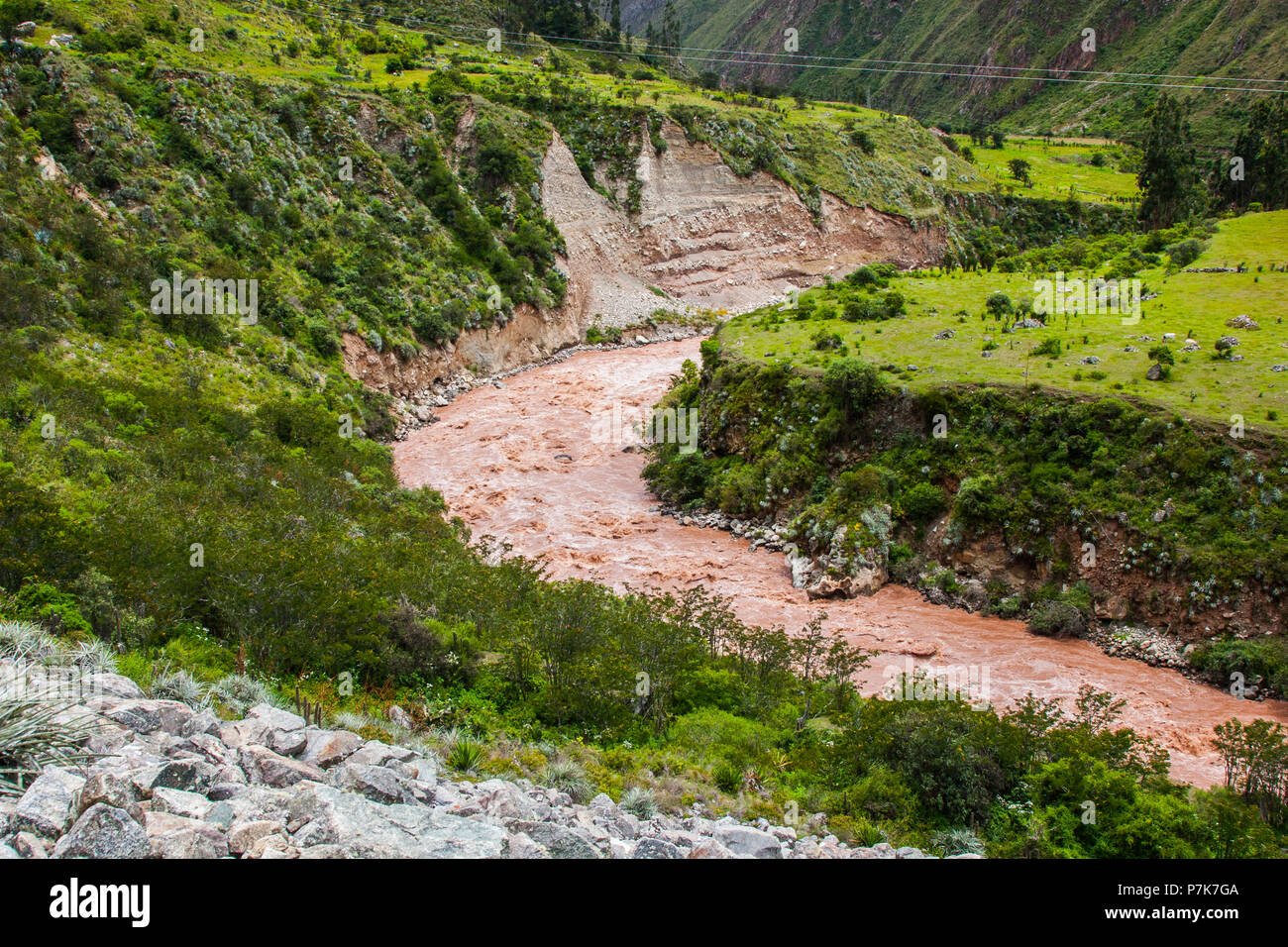 Urubamba River water flow near Ollantaytambo village in the Sacred ...