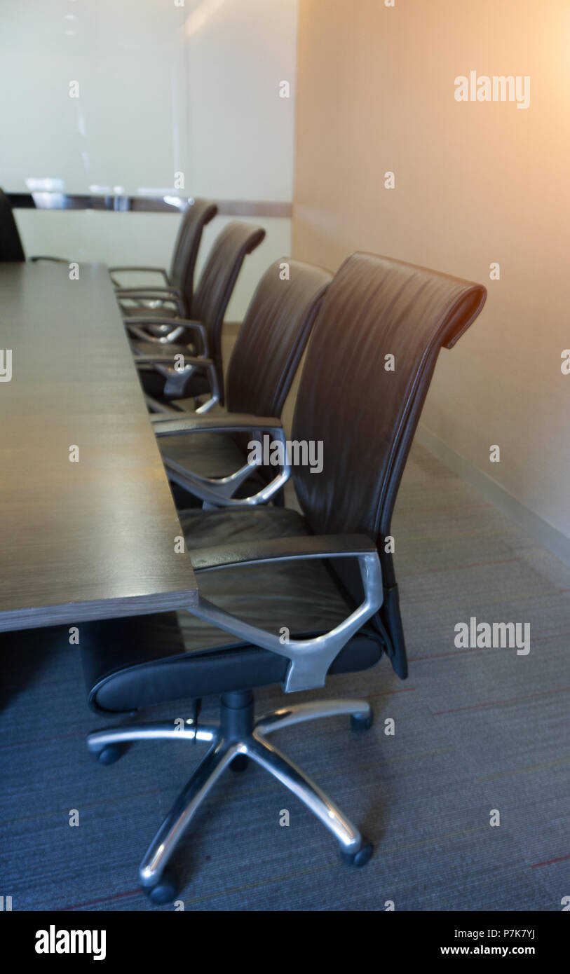 Four Empty corporate chair in conference room before business meeting ...