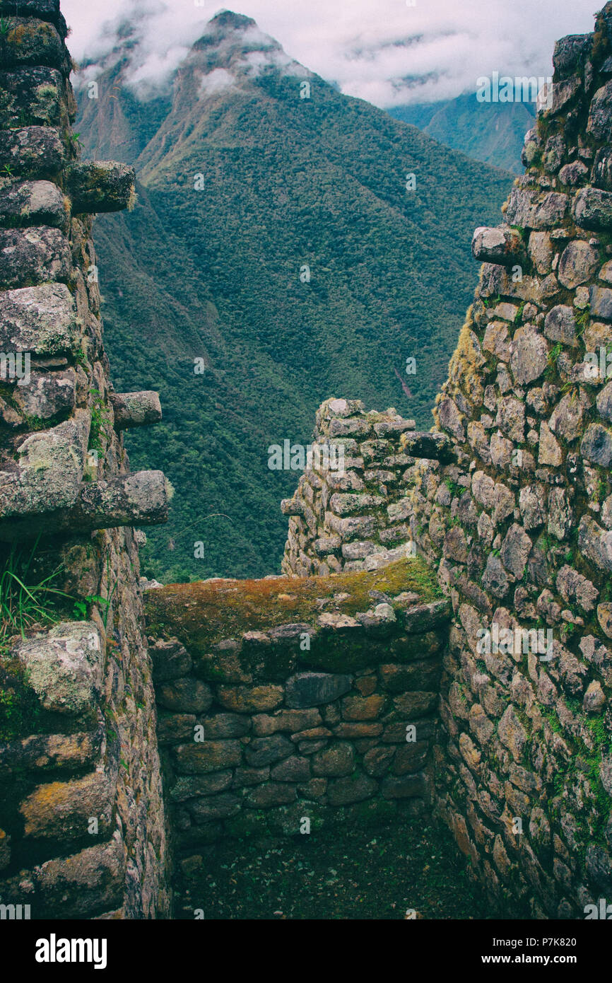 Ancient stone ruins of an Inca town on the Inca Trail in the Andes ...