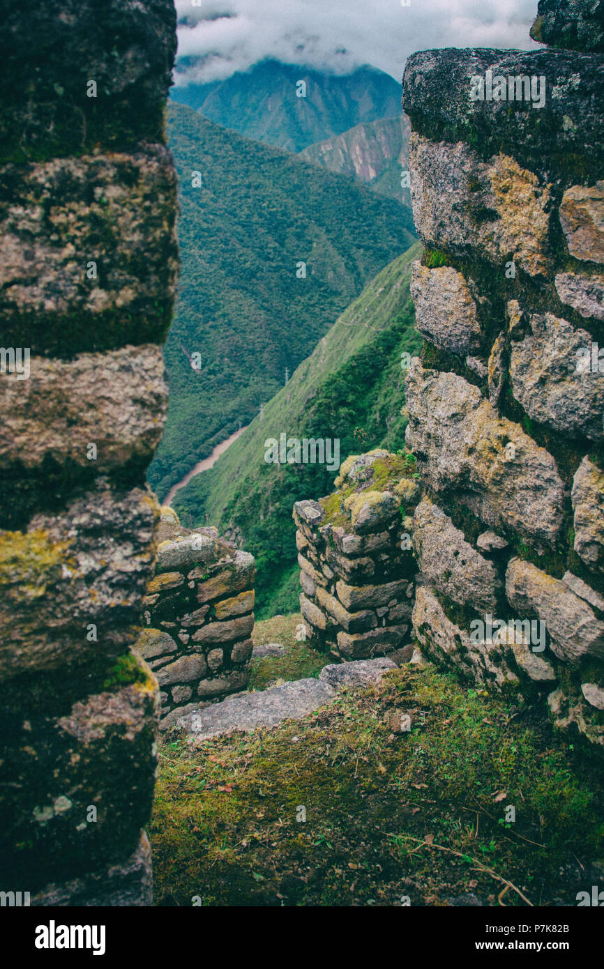 Ancient stone ruins of an Inca town on the Inca Trail in the Andes ...