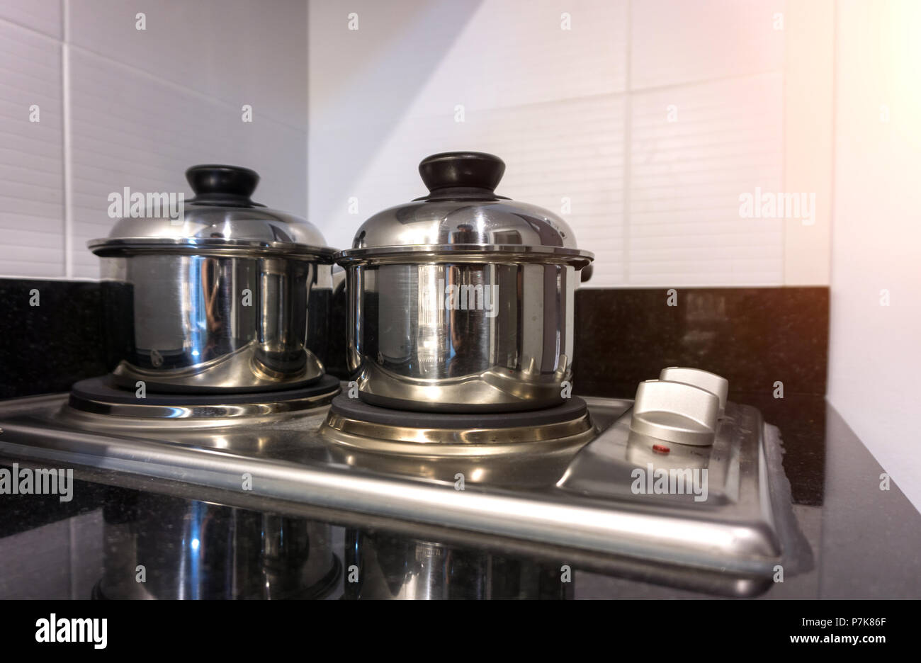 Water boiling in silver pot hi-res stock photography and images - Alamy