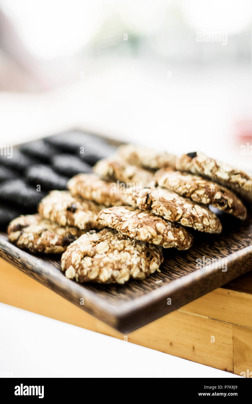 mixed fresh organic oat biscuit cookies in bakery display Stock Photo ...