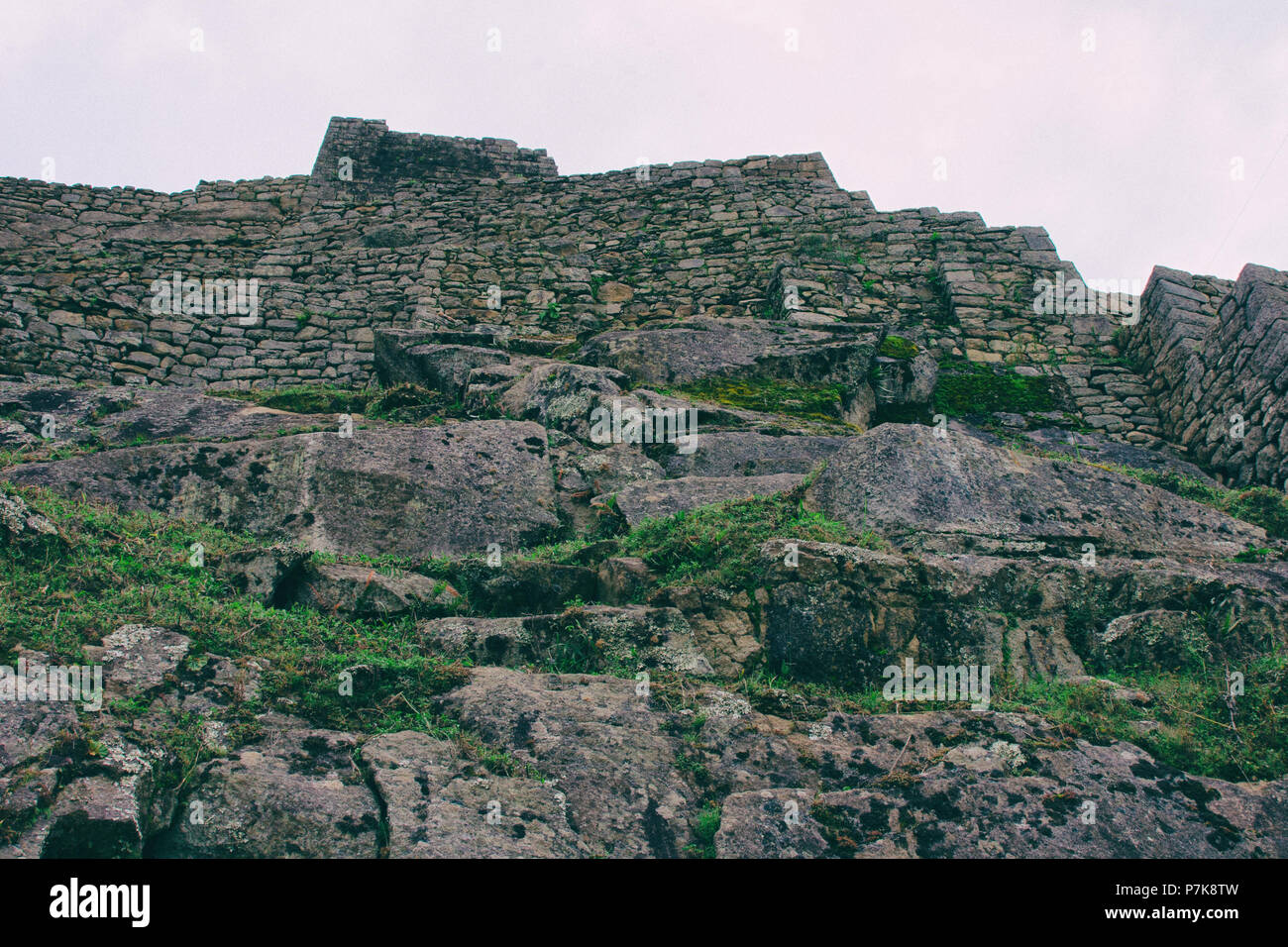 Rocks and stone wall ruins at Machu Picchu.UNESCO world heritage site ...