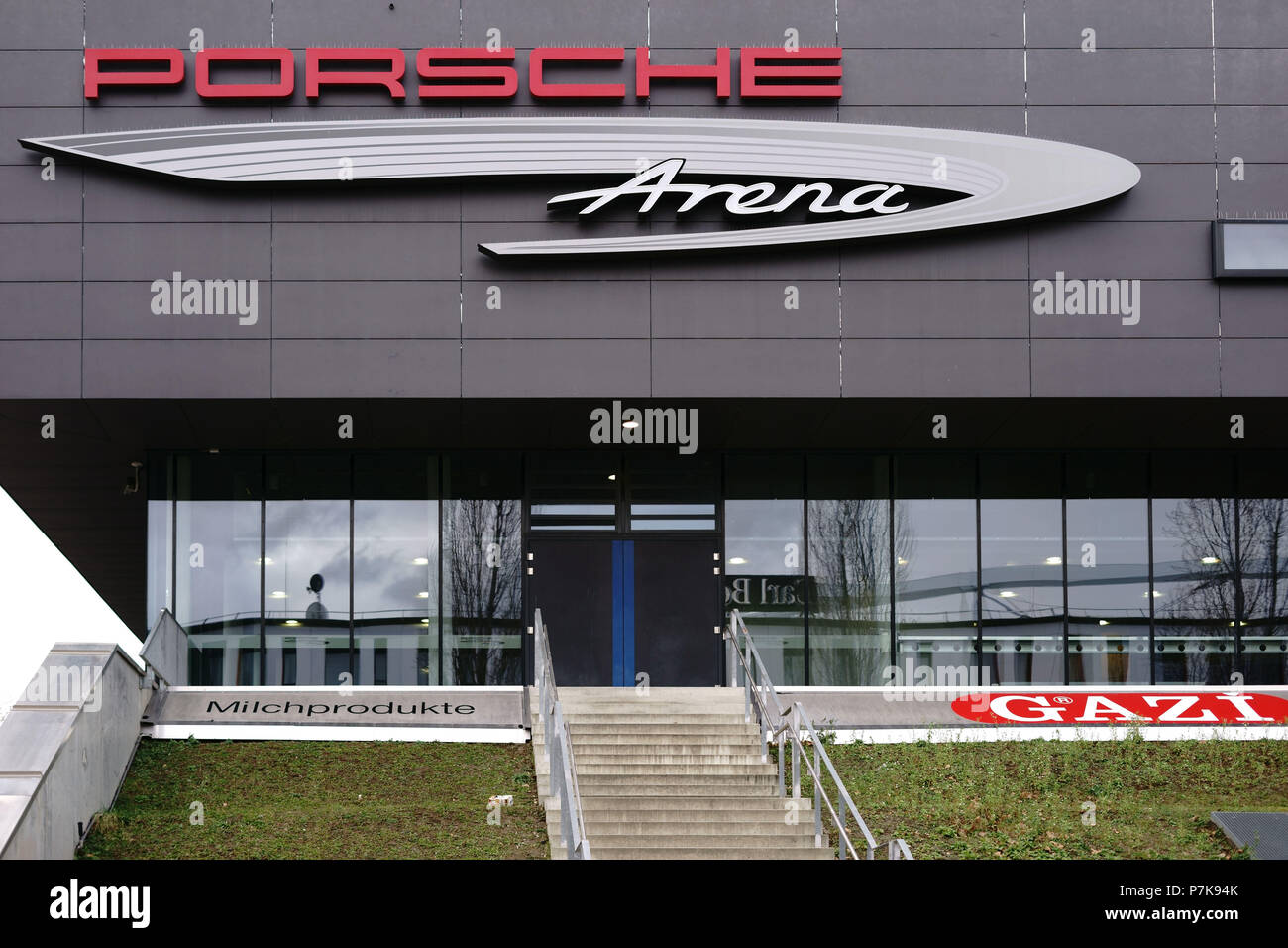 Glass entrance and the modern façade of the Porsche Arena in Stuttgart ...