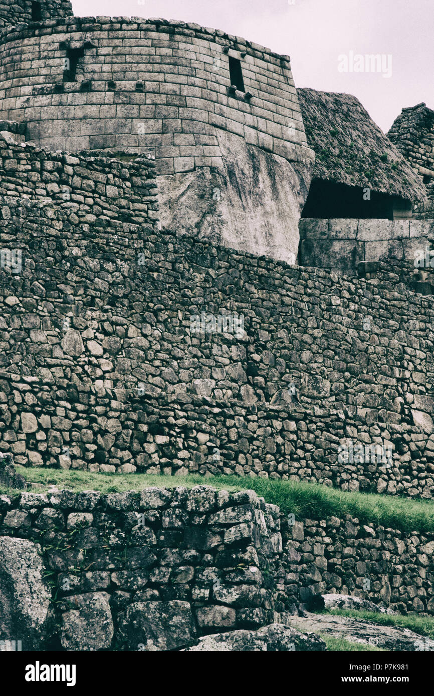 Stone magical ancient ruins along the paved path Inca Trail to Machu ...