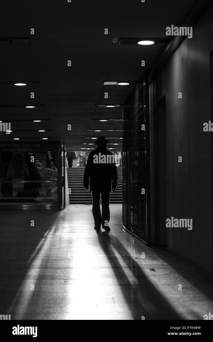 Man in black long Black and White Stock Photos & Images - Alamy