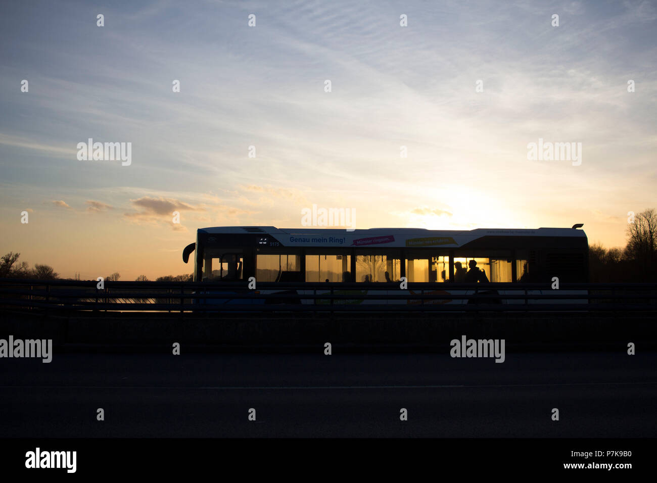 Bus in the backlight Stock Photo - Alamy