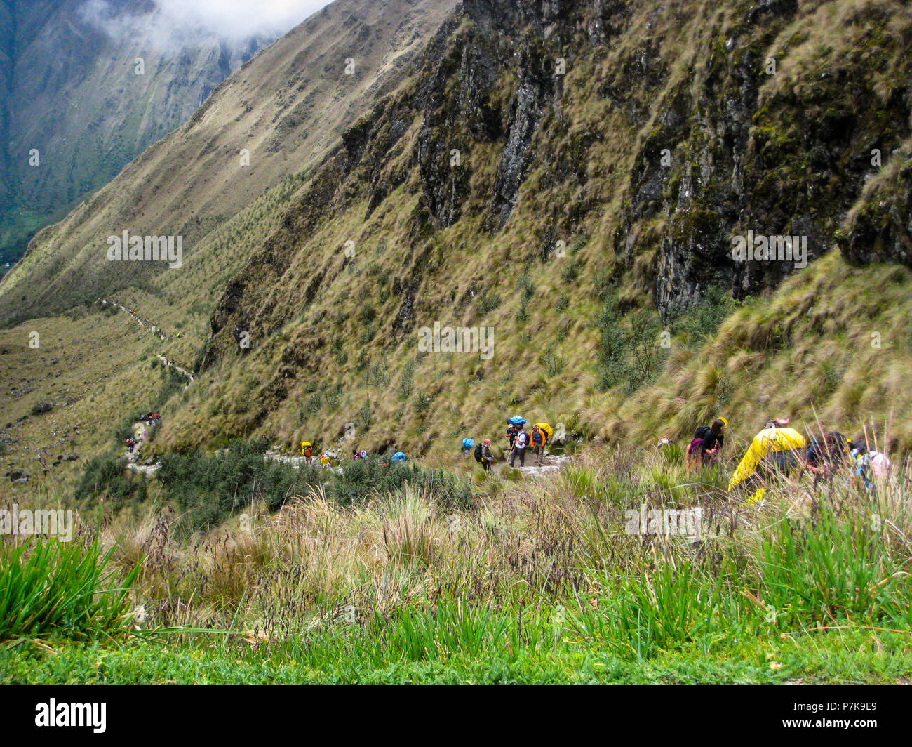 Ancient Inca Trail paved path to the lost city of Machu Picchu. Peru ...