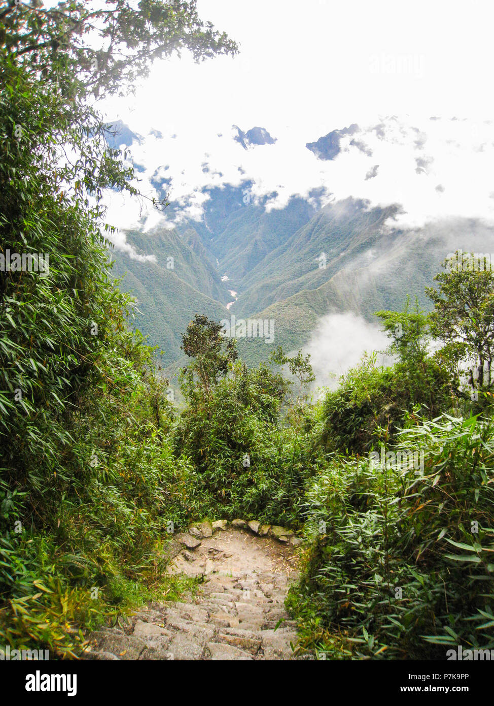 Ancient Inca Trail paved path to the lost city of Machu Picchu. Peru ...