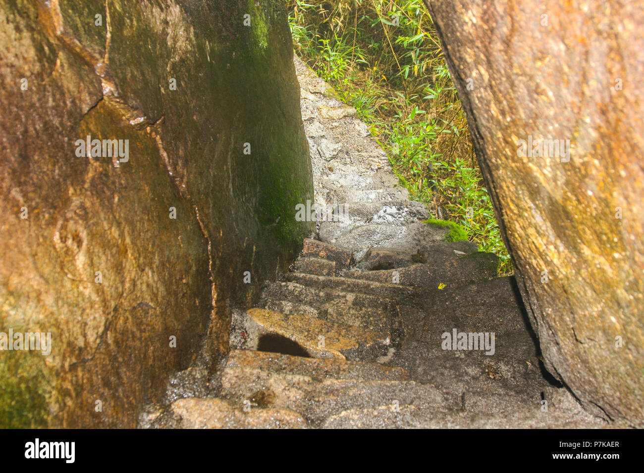 Ancient Inca Trail paved path to the lost city of Machu Picchu. Peru ...