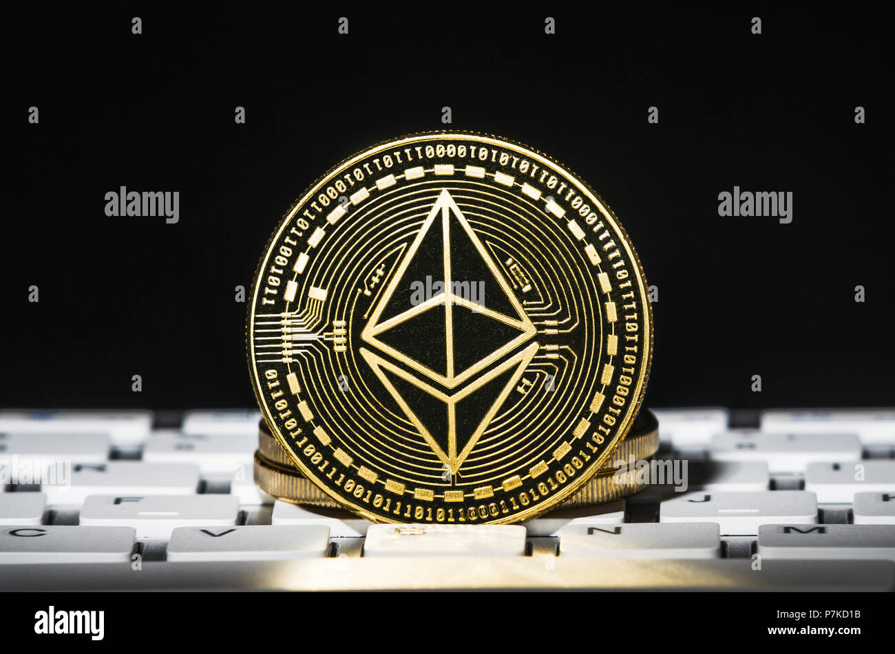 Ethereum crypto-currency on keyboard with black background Stock Photo ...