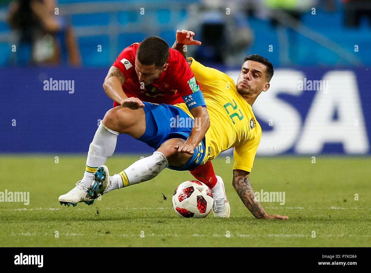 Eden Hazard of Belgium is fouled by Fagner of Brazil during the 2018 ...