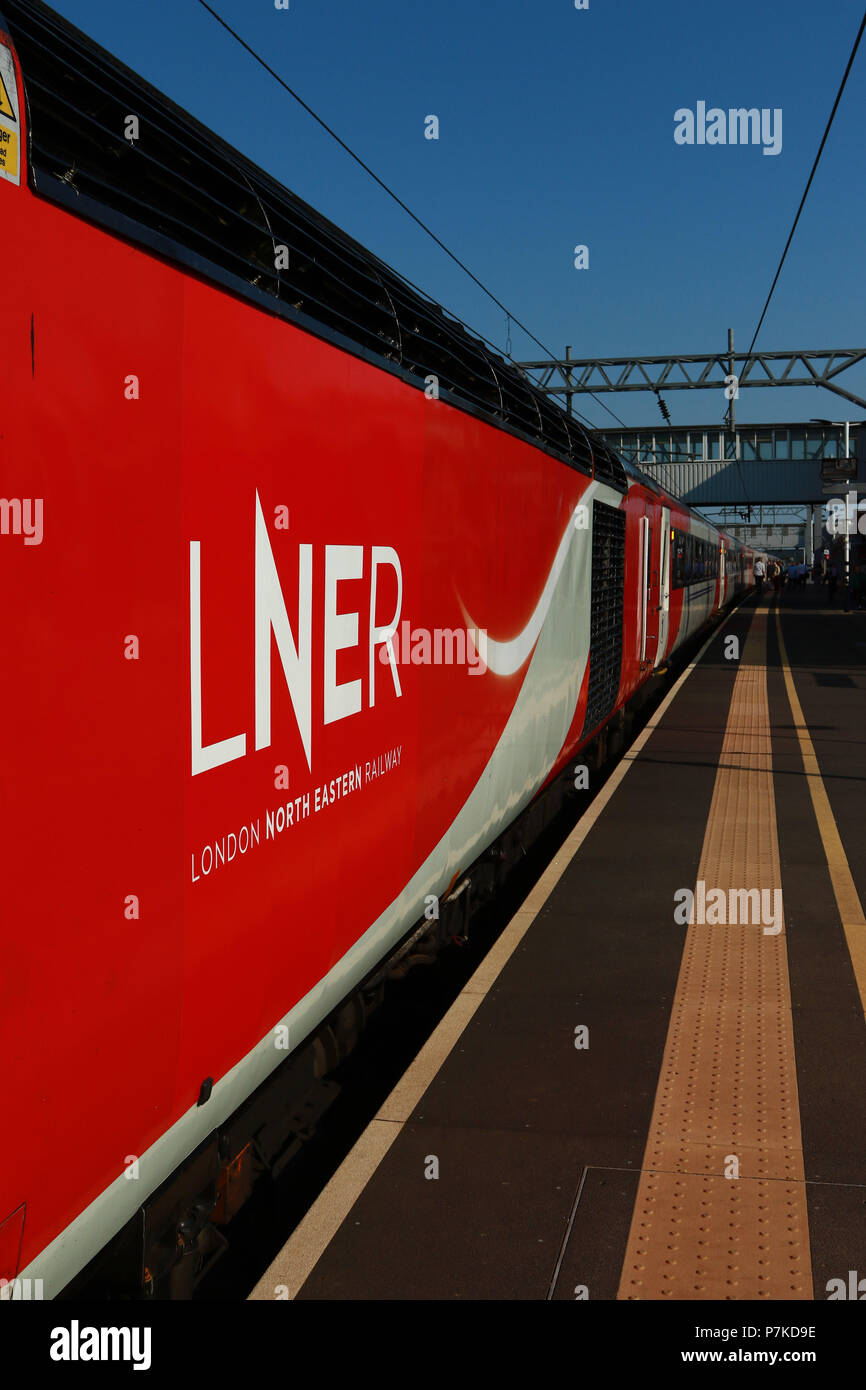 A train with LNER (London North Eastern Railway) livery at Peterborough ...