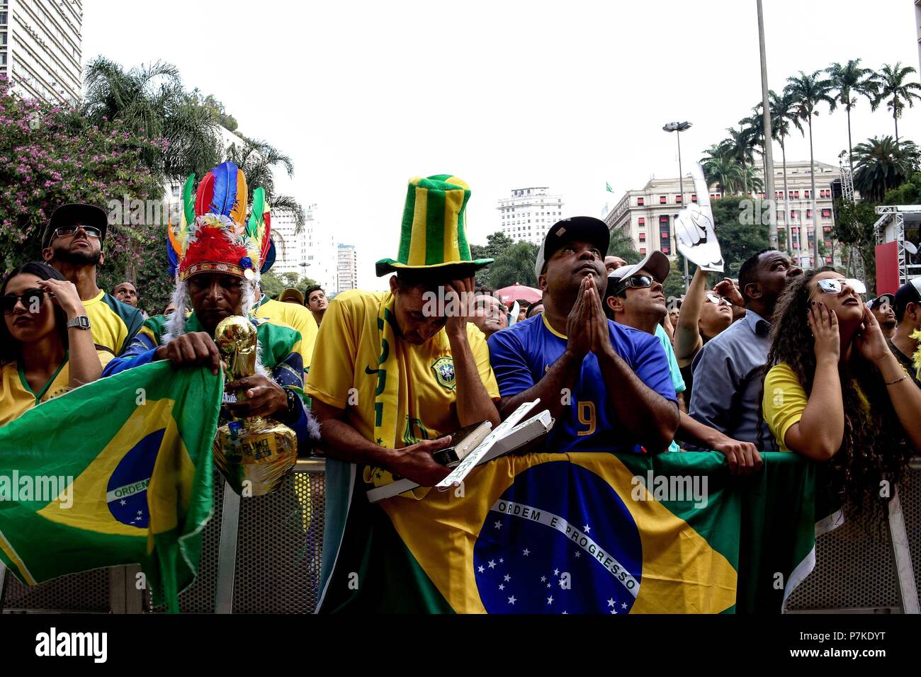 Sao Paulo, Brazil. 6th July, 2018. Brazilian fans cry after watching ...