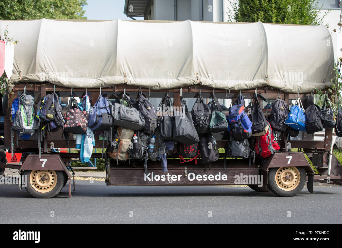 Glandorf, Germany. 07th July, 2018. Pilgrims' backpacks hanging from an ...