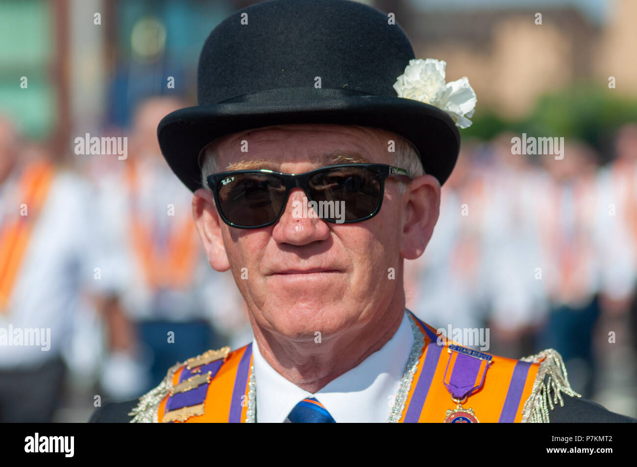 Man wearing orange sash hi-res stock photography and images - Alamy