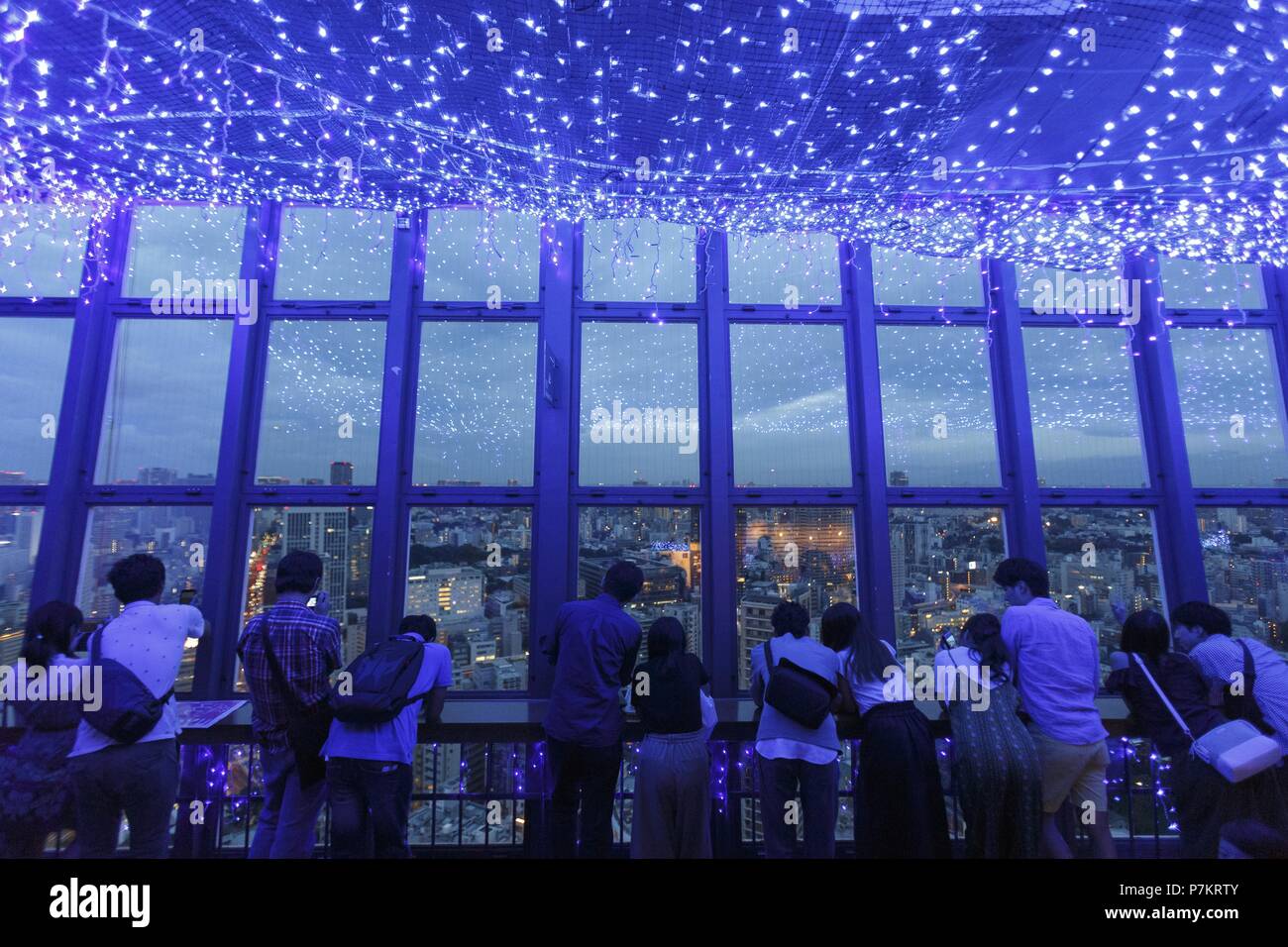 Tokyo, Japan. 7th July, 2018. Visitors enjoy the view of Tokyo City ...