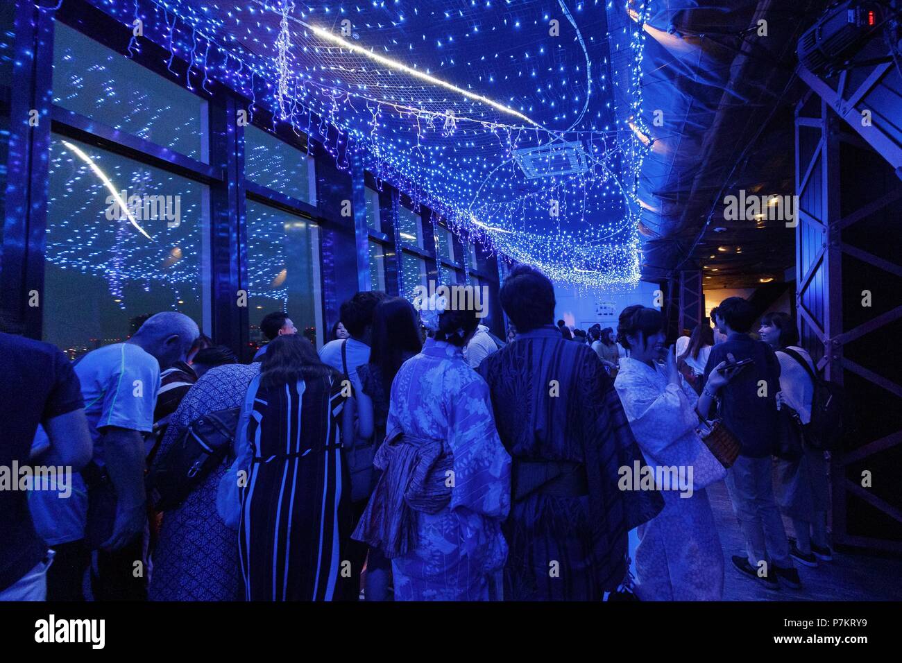 Tokyo, Japan. 7th July, 2018. Visitors enjoy the Milky Way Illumination ...