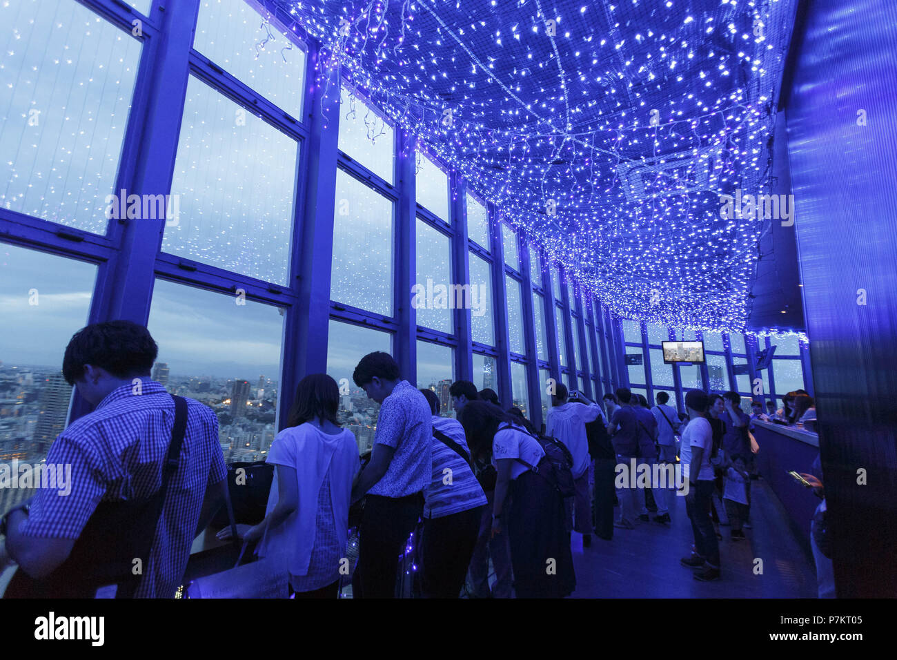 Tokyo, Japan. 7th July, 2018. Visitors enjoy the view of Tokyo City ...