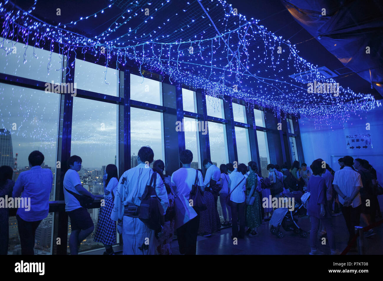 Tokyo, Japan. 7th July, 2018. Visitors enjoy the view of Tokyo City ...