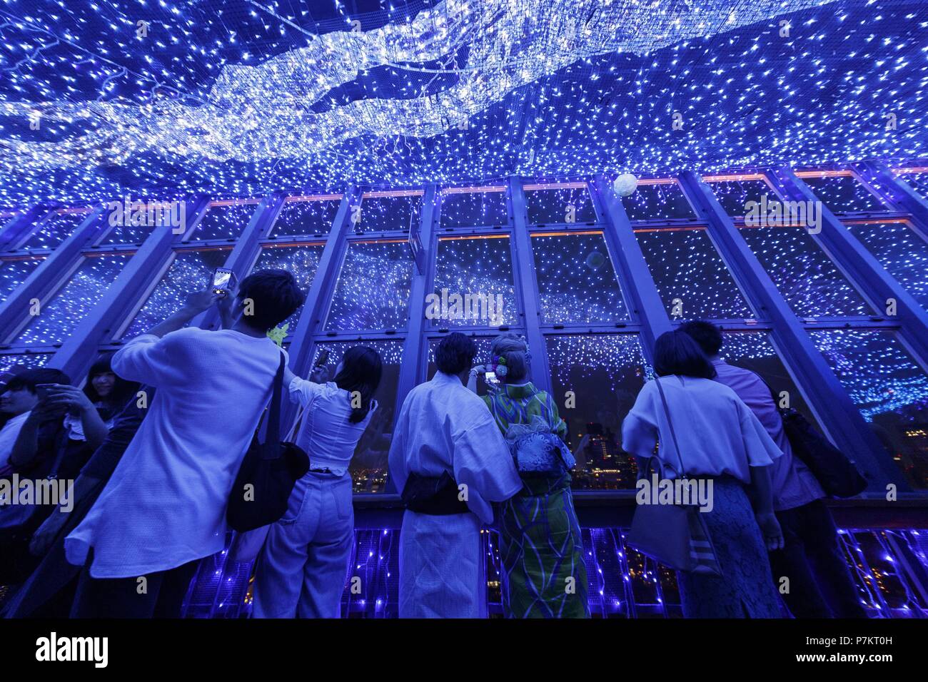 Tokyo, Japan. 7th July, 2018. Visitors enjoy the Milky Way Illumination ...