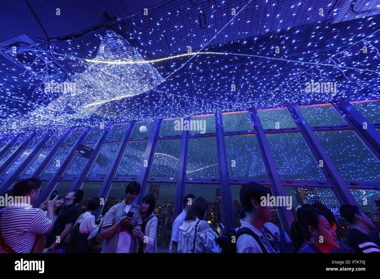 Tokyo, Japan. 7th July, 2018. Visitors enjoy the Milky Way Illumination ...
