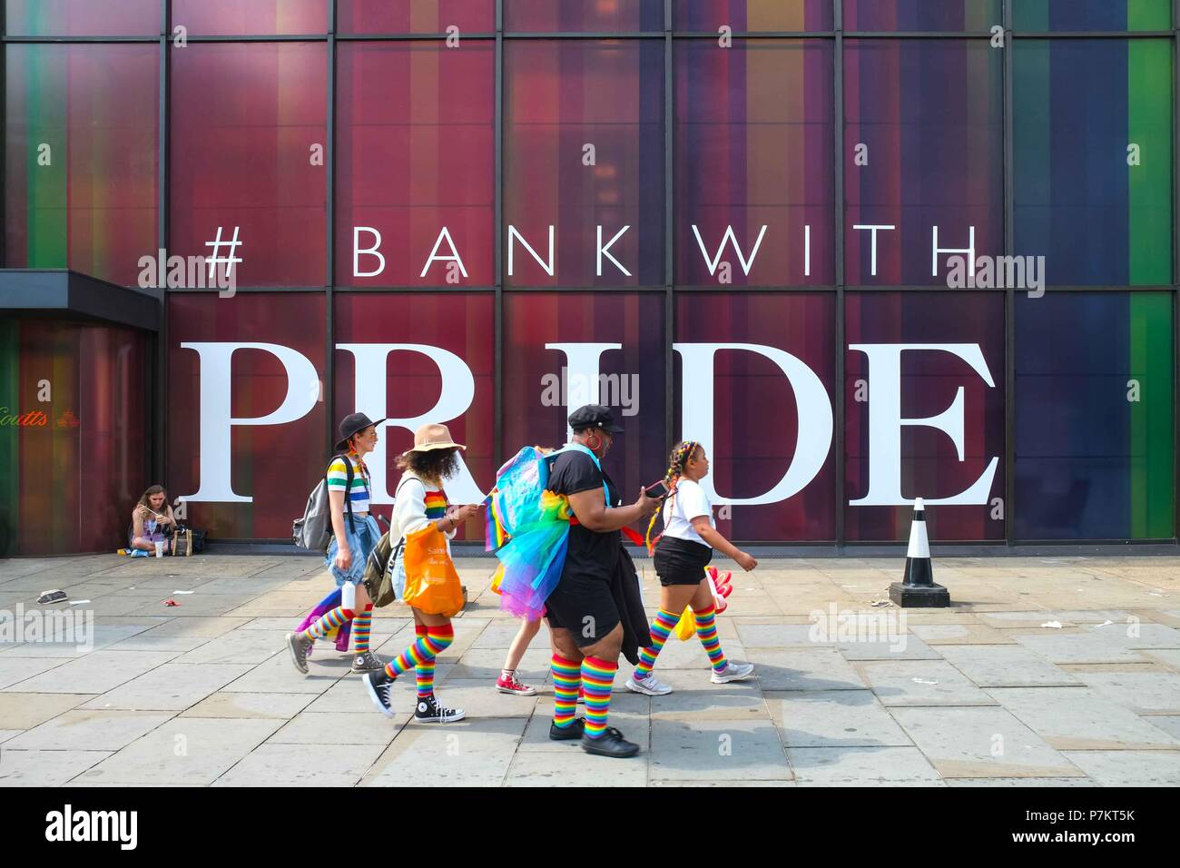 London 7th July 2018: A group of Pride 2018 party goers walk past ...