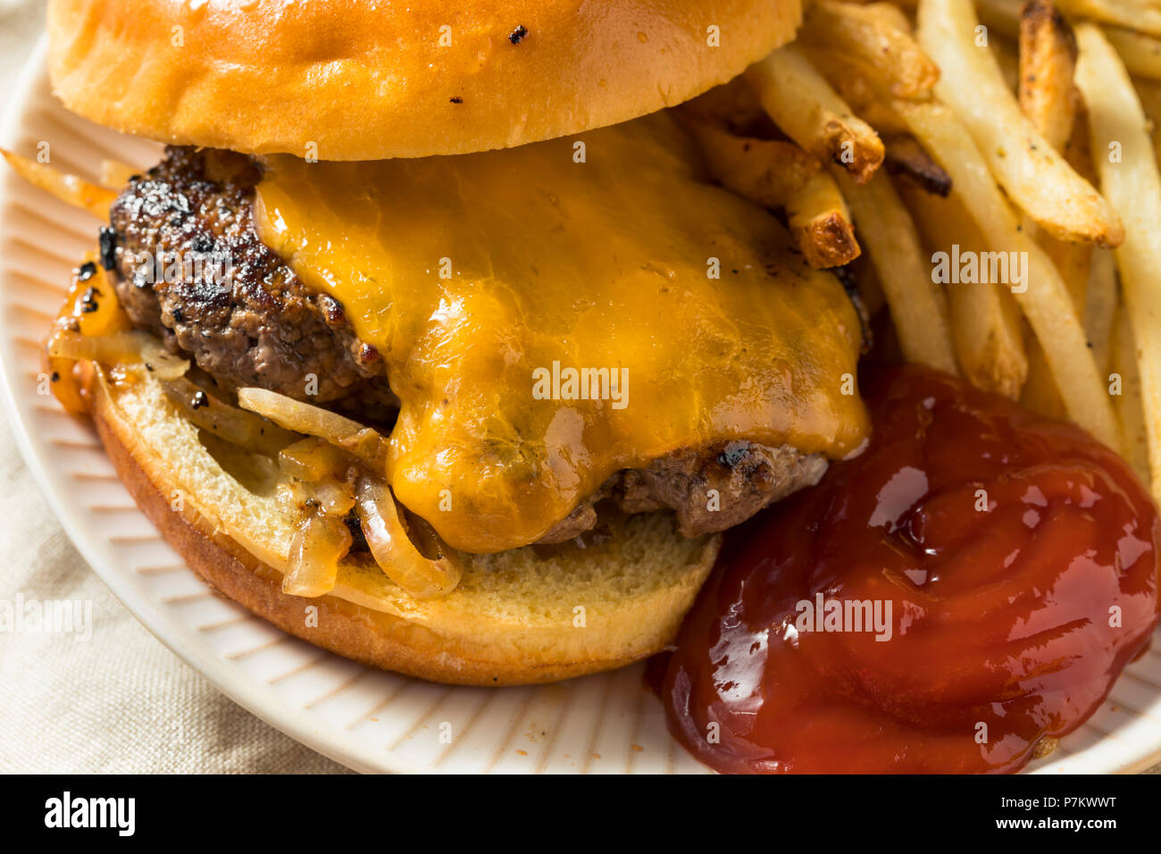 Homemade Oklahoma Fried Onion Cheeseburgers with Cheddar Stock Photo ...