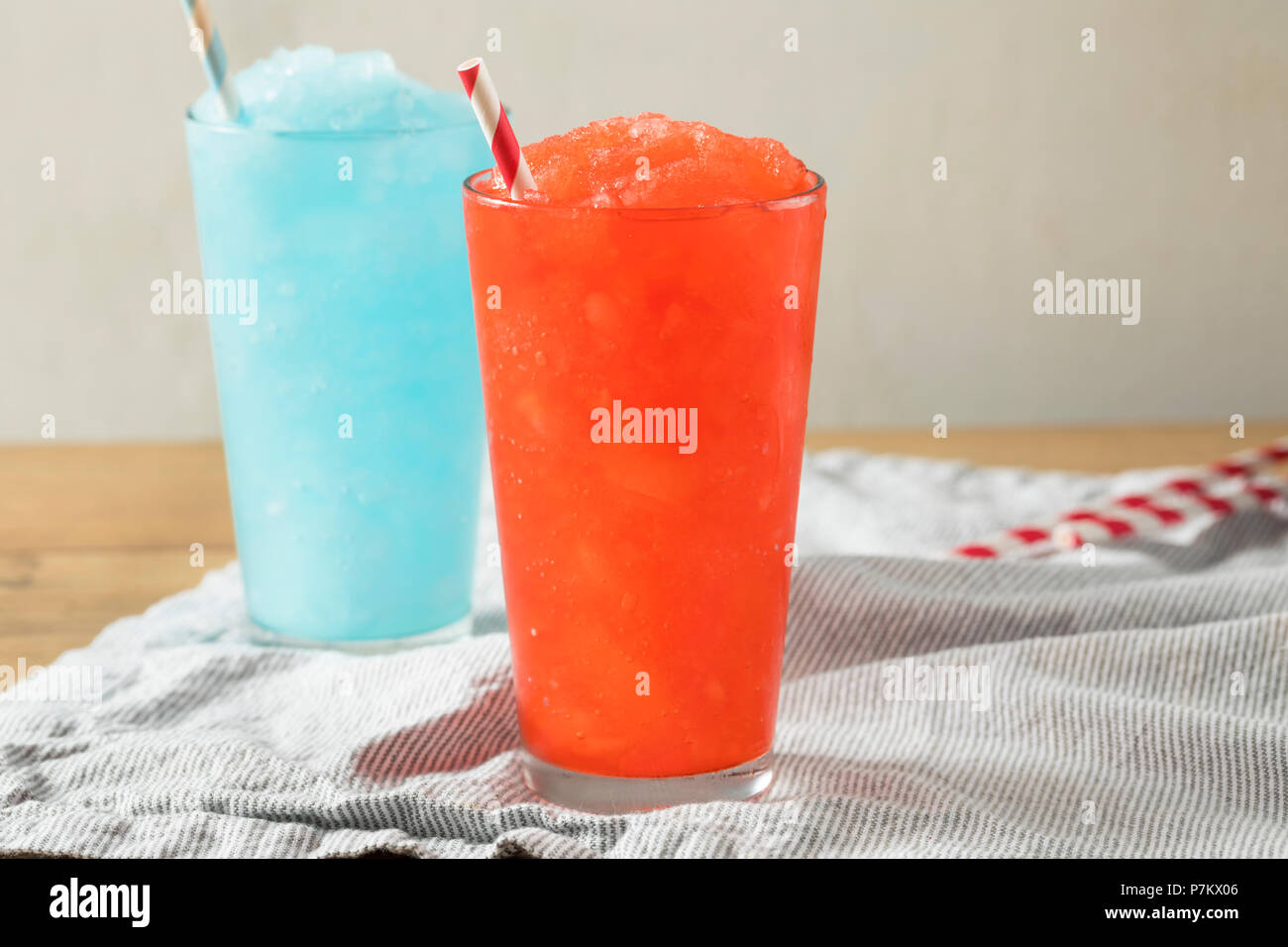 Frozen Red and Blue Slushies with Straws Stock Photo - Alamy