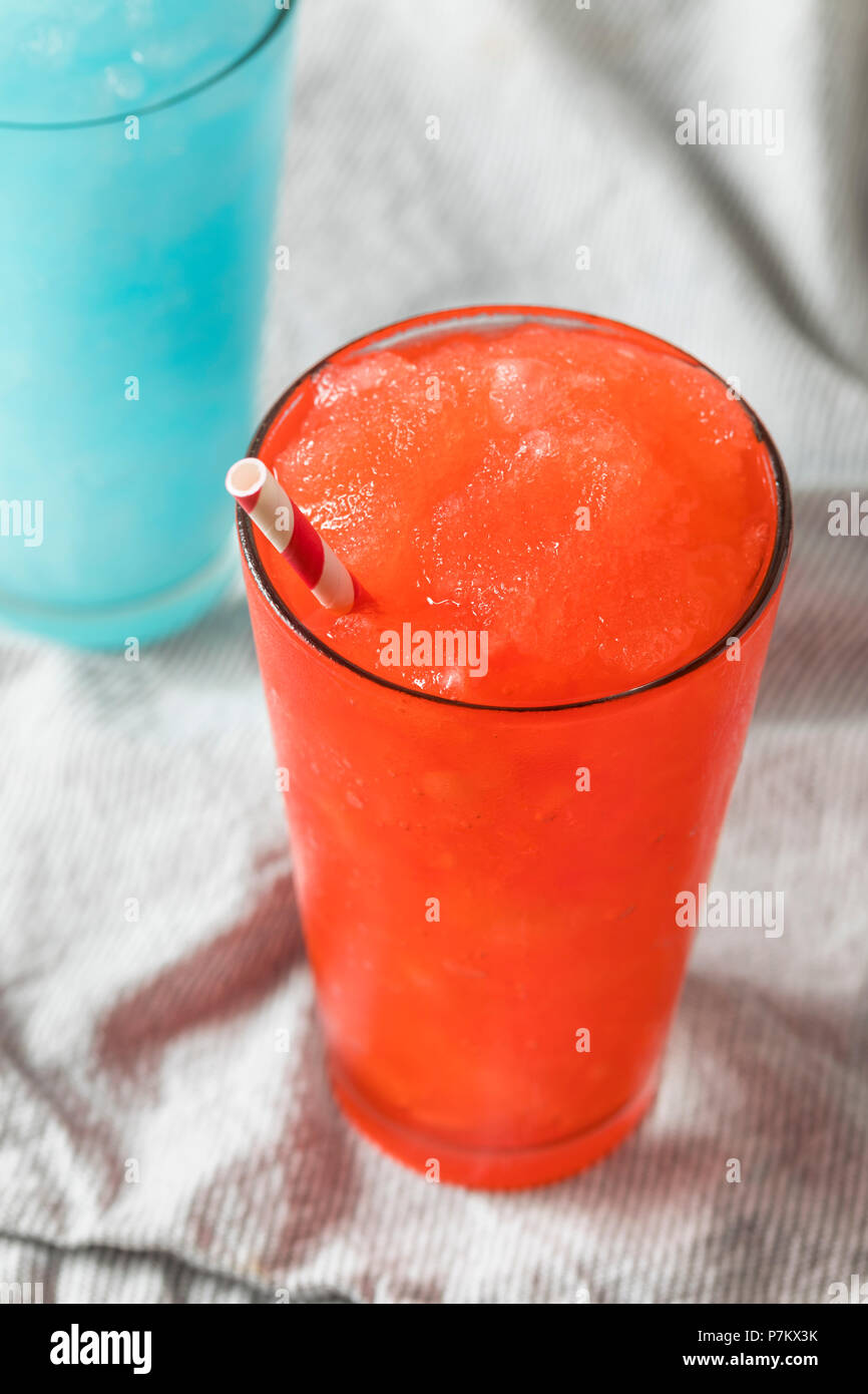 frozen Red and Blue Slushies with Straws Stock Photo - Alamy