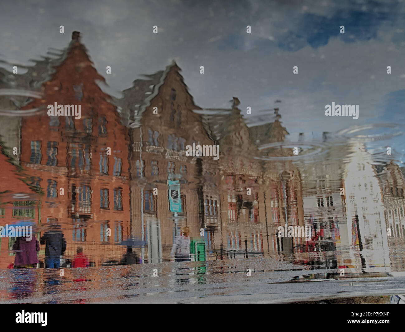 Houses reflecting in a puddle in Bergen, Norway, historic row of houses ...