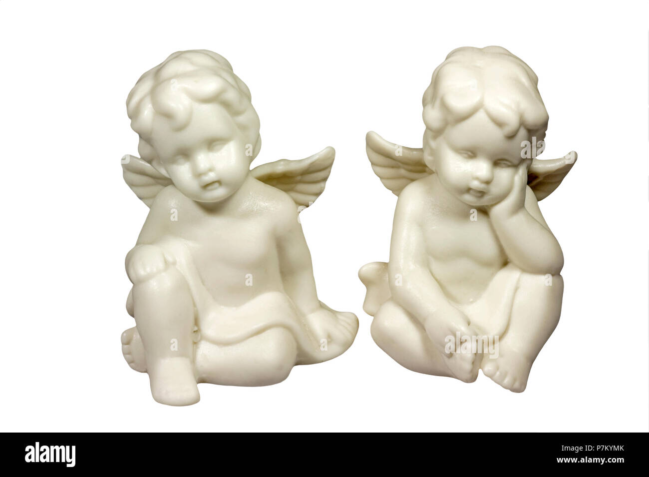 Two ceramic little angels isolated on White (can be used in christmas ...
