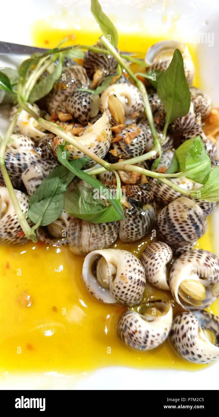 Snail with Vietnamese ingredient Stock Photo - Alamy