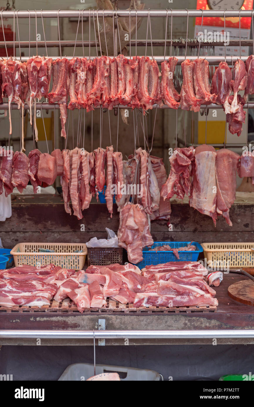 Hanging Fresh Meat Parts at Butcher Shop Stock Photo - Alamy