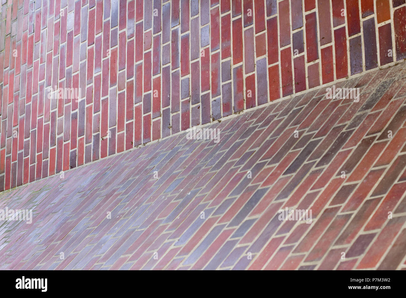Brick wall with diagonal edge Stock Photo - Alamy