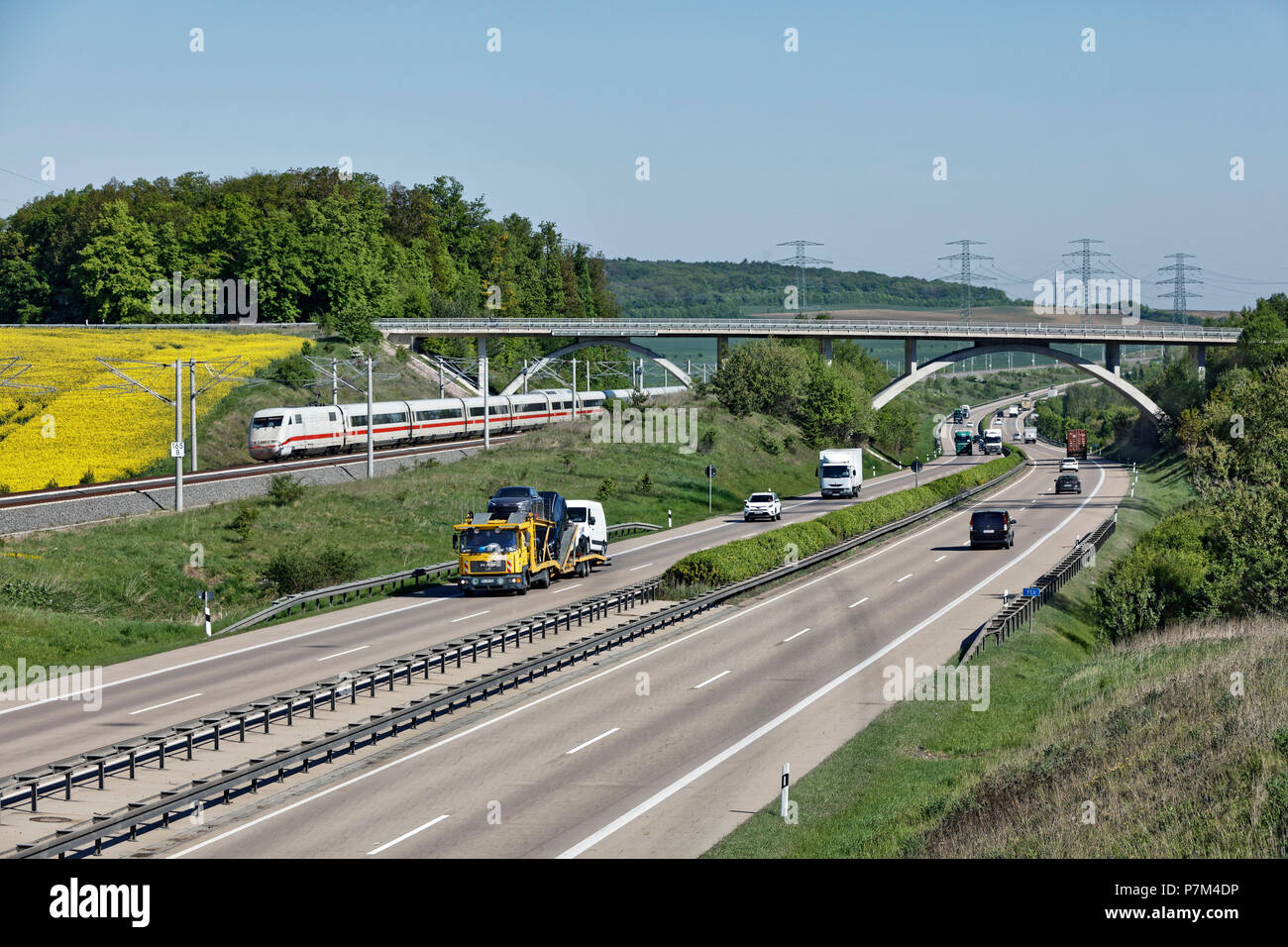 Train, highway, bridge Stock Photo - Alamy