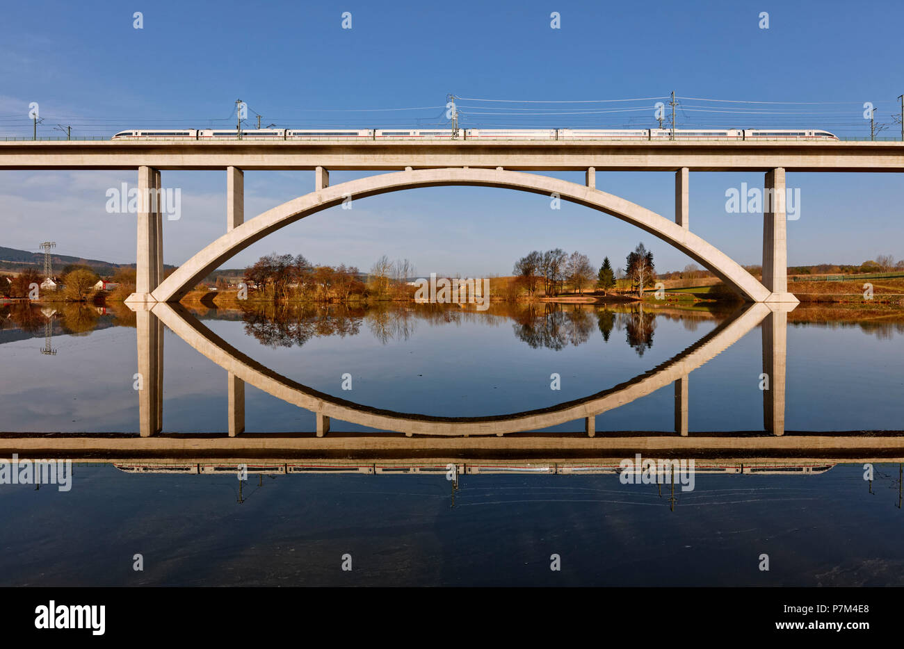 Train, bridge, lake, reflection Stock Photo - Alamy